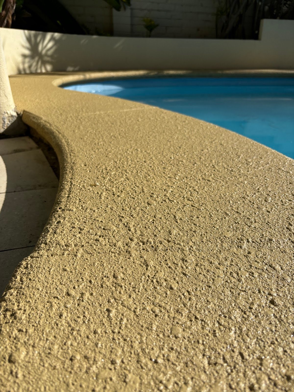 Can You Resurface Concrete Around a Pool?